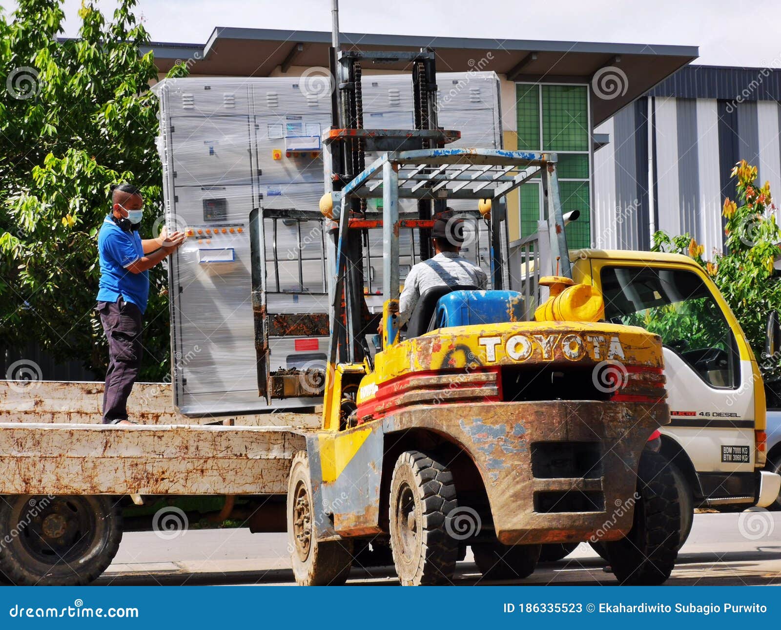 Forklift Operator Loading Switchboard at the Back of Lorry on June 6th ...