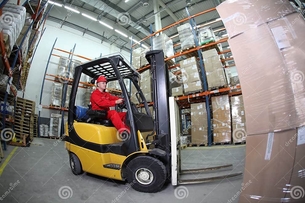 Forklift Operator at Work in Warehouse Stock Photo - Image of ...