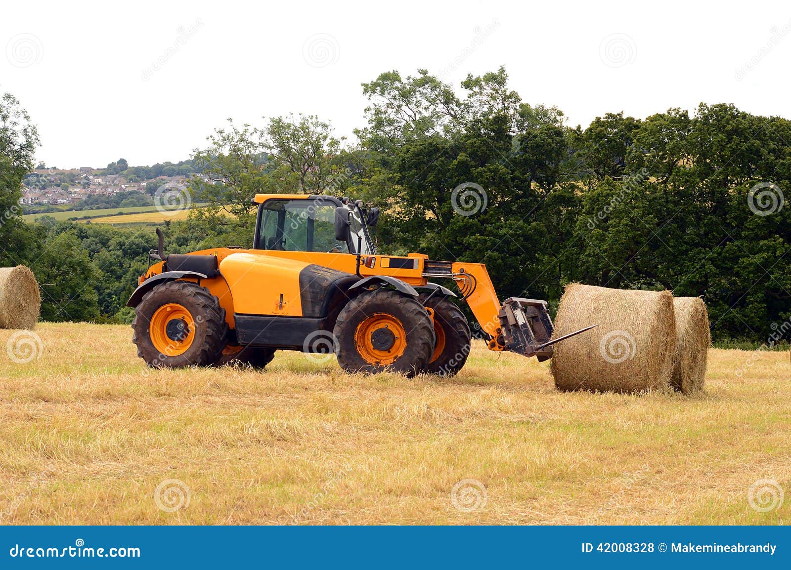 Forklift / Telehandler with Straw Bales in Field Stock Photo - Image of ...