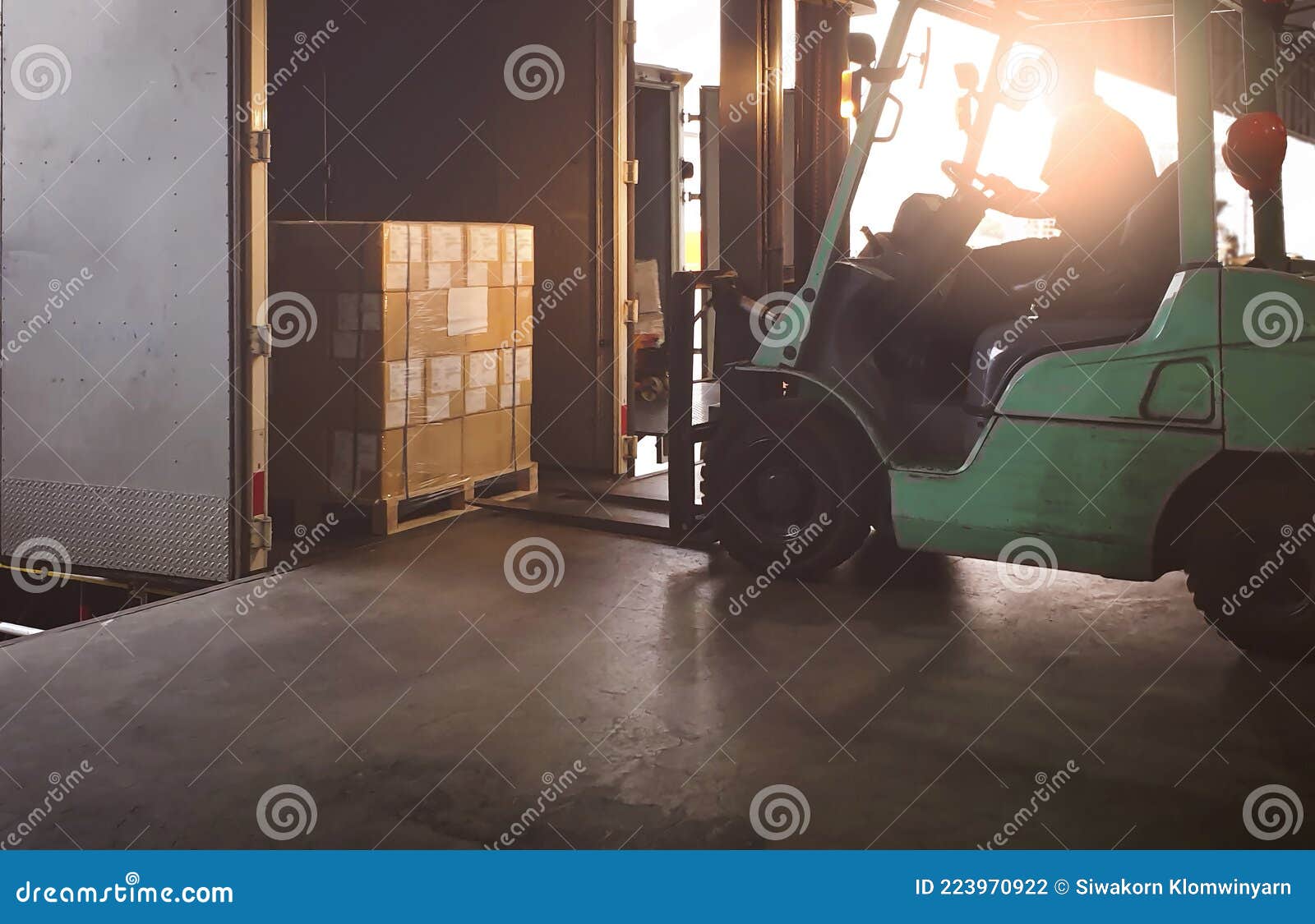 Forklift Tractor Loading Package Boxes Into Cargo Container At Dock ...