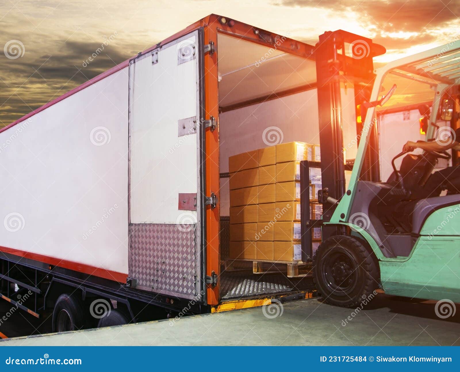 Forklift Tractor Loading Package Boxes Into Cargo Container At Dock ...
