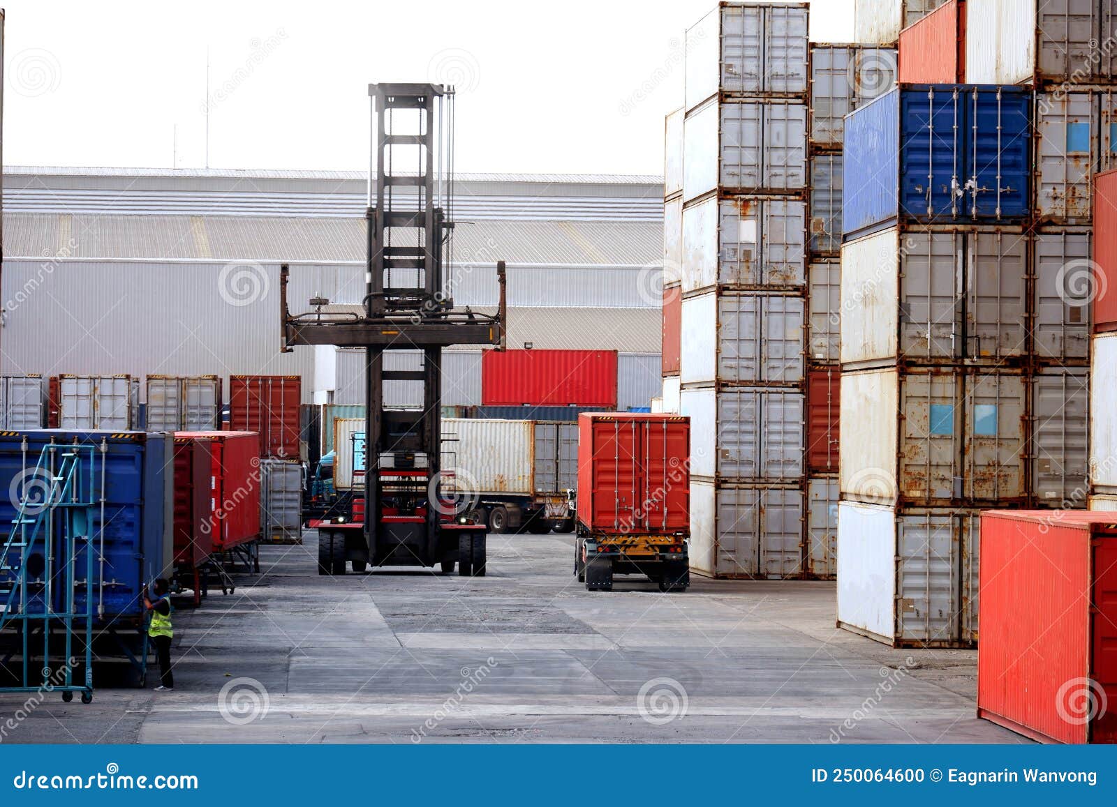 Forklift Truck Handling Cargo Container Boxes In Logistic Delivery Yard ...