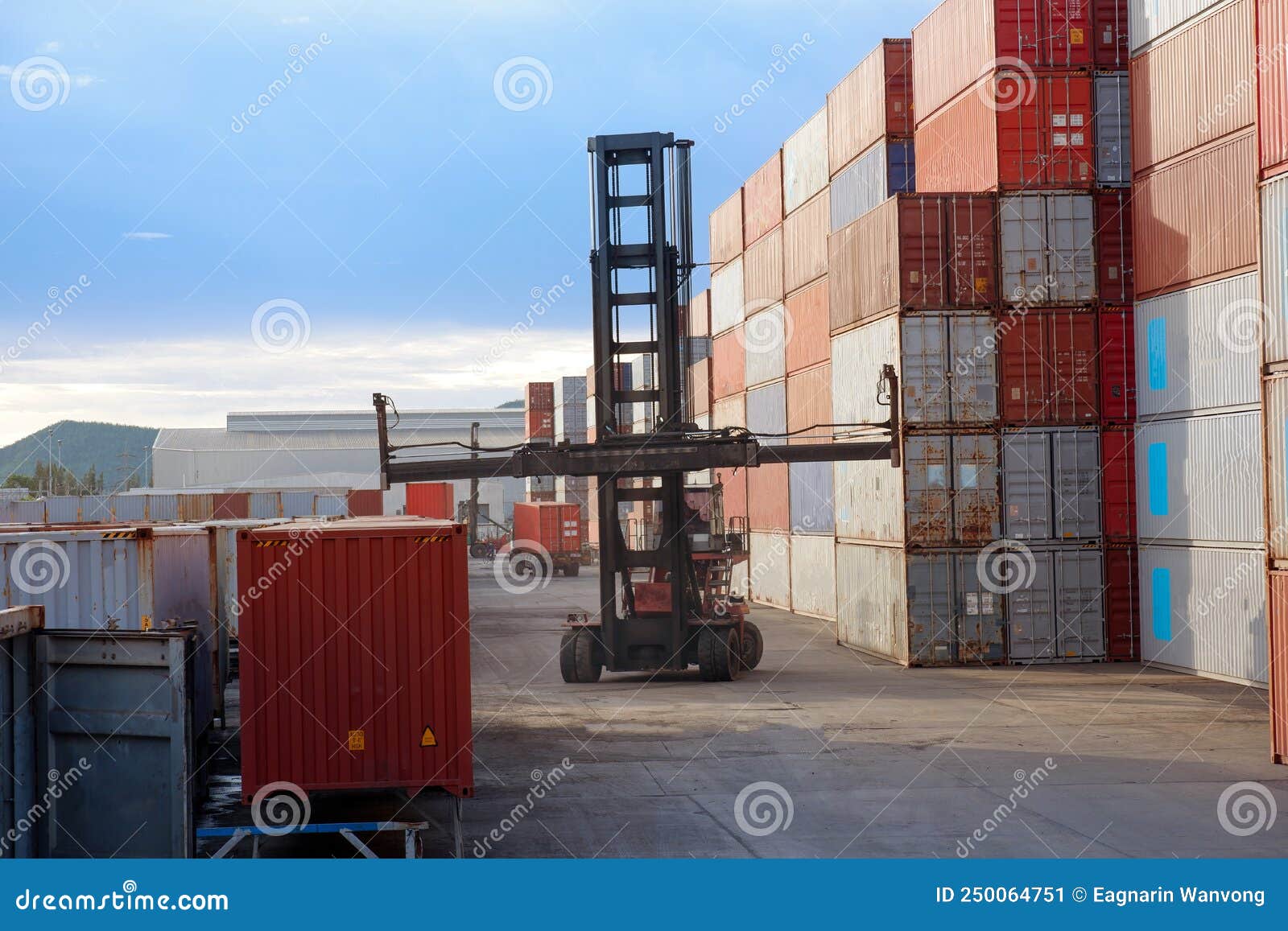 Forklift Truck Handling Cargo Container Boxes In Logistic Delivery Yard ...