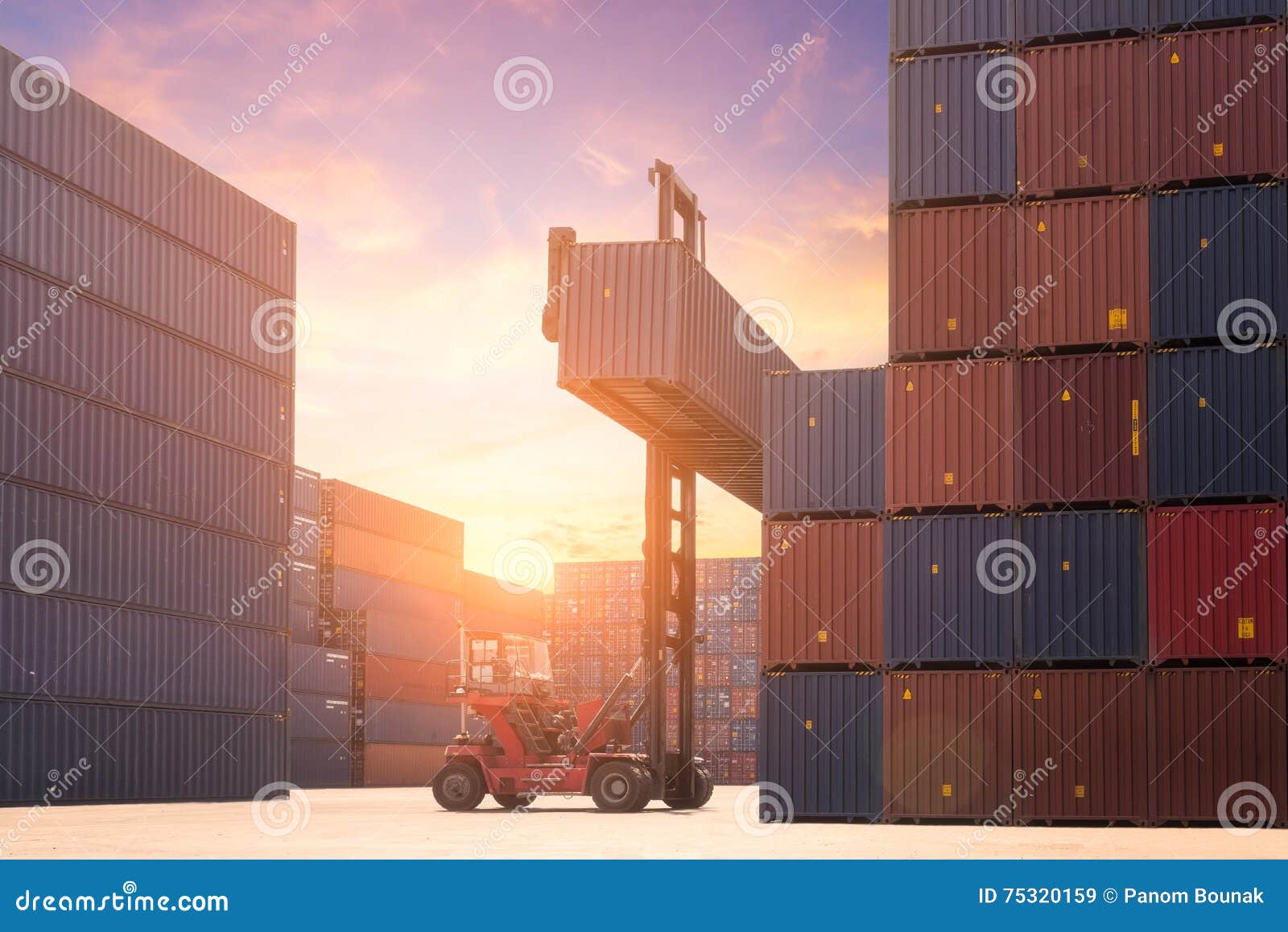 Forklift Truck Lifting Cargo Container in Shipping Yard or Dock Stock ...