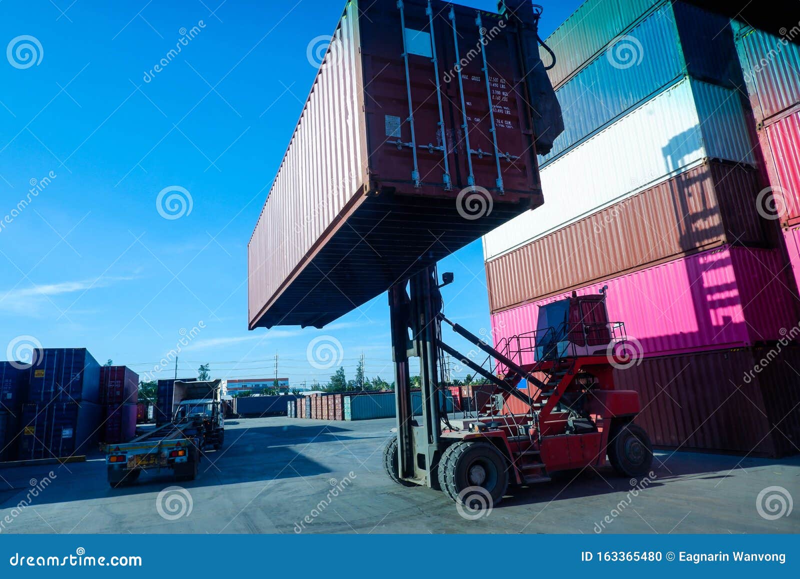 Forklift Trucks Container Shipping Trucks in the Container Yard for the ...