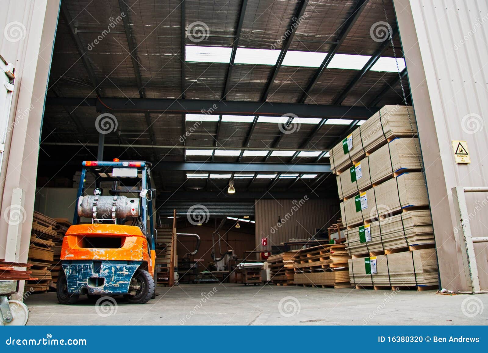 Forklift in a warehouse stock photo. Image of manufacturing - 16380320