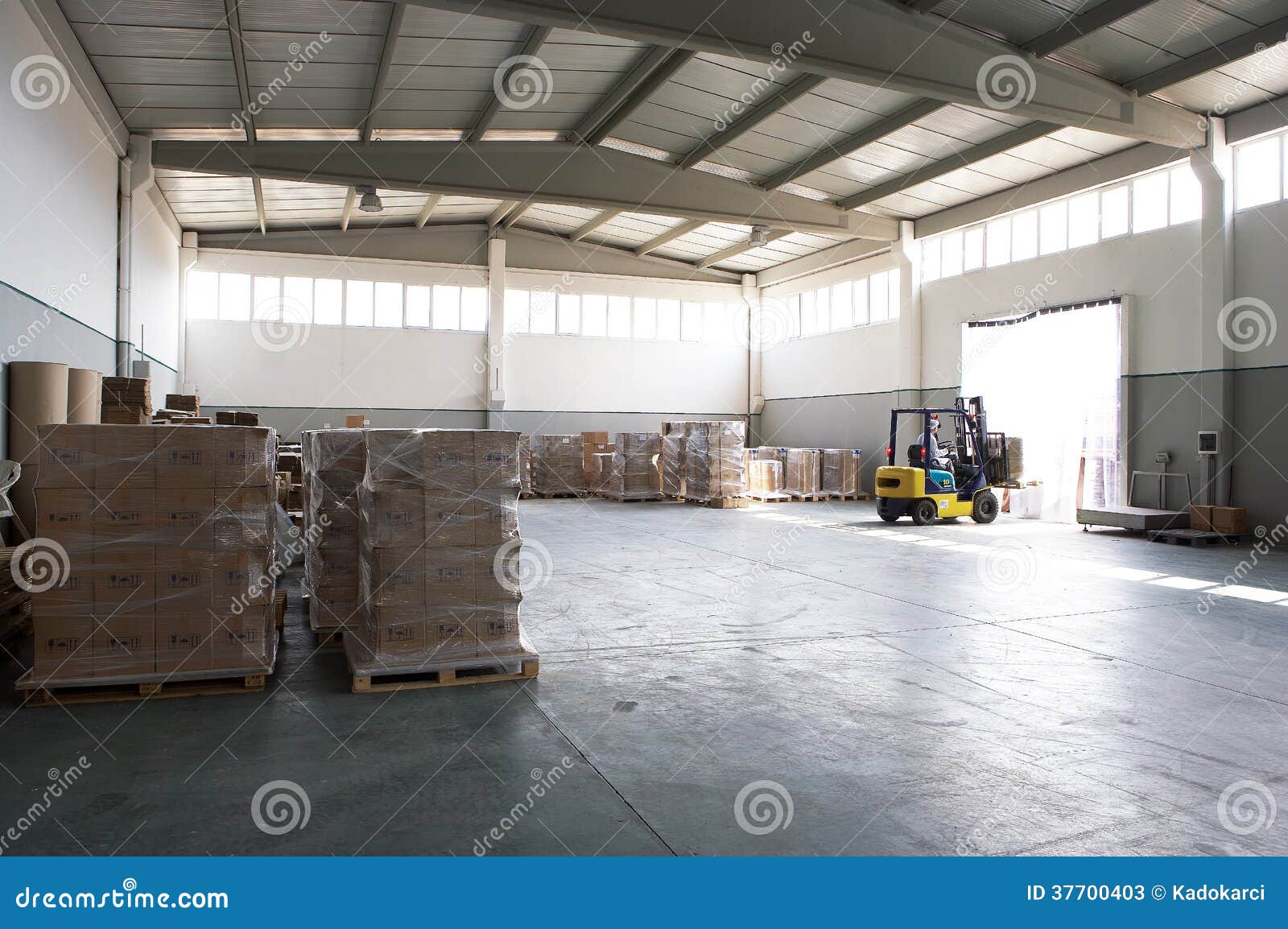 Forklift in warehouse stock image. Image of forklift - 37700403