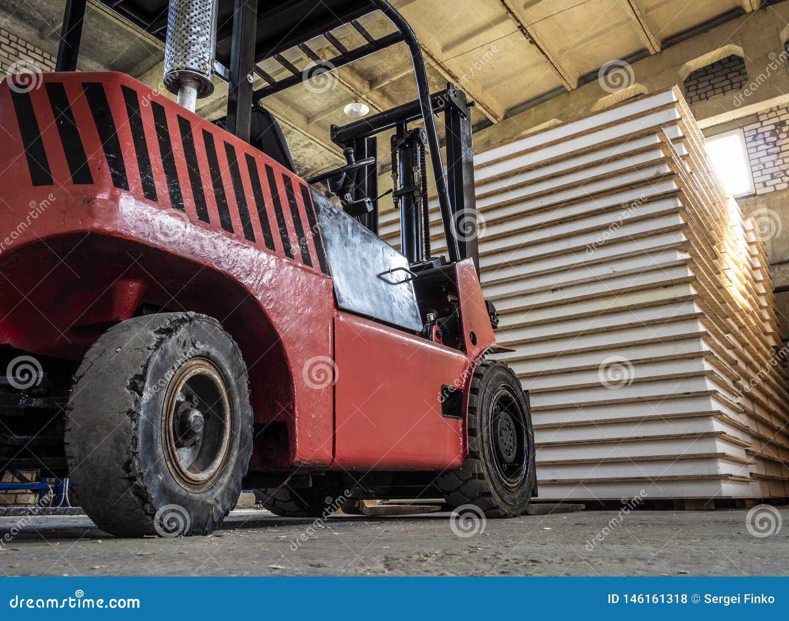 Forklift in a warehouse stock photo. Image of industrial - 146161318