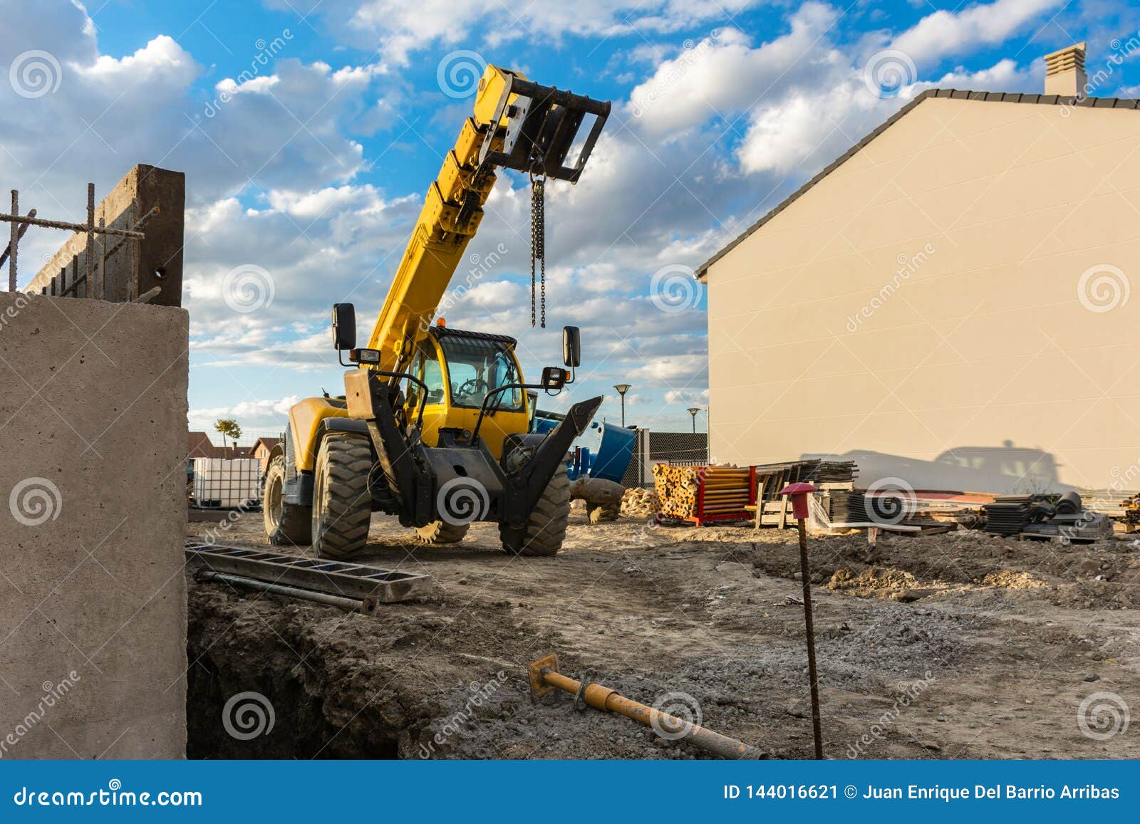 Forklifts in the Construction of a Single-family House Stock Image ...