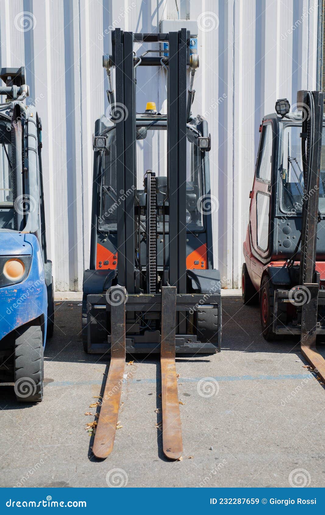 Forklifts Parked Outside a Storage Center Stock Image - Image of ...