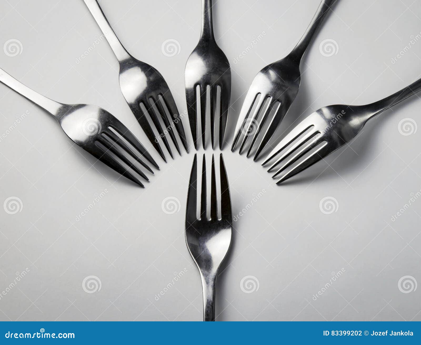 Forks abstract composition stock photo. Image of reflection - 83399202