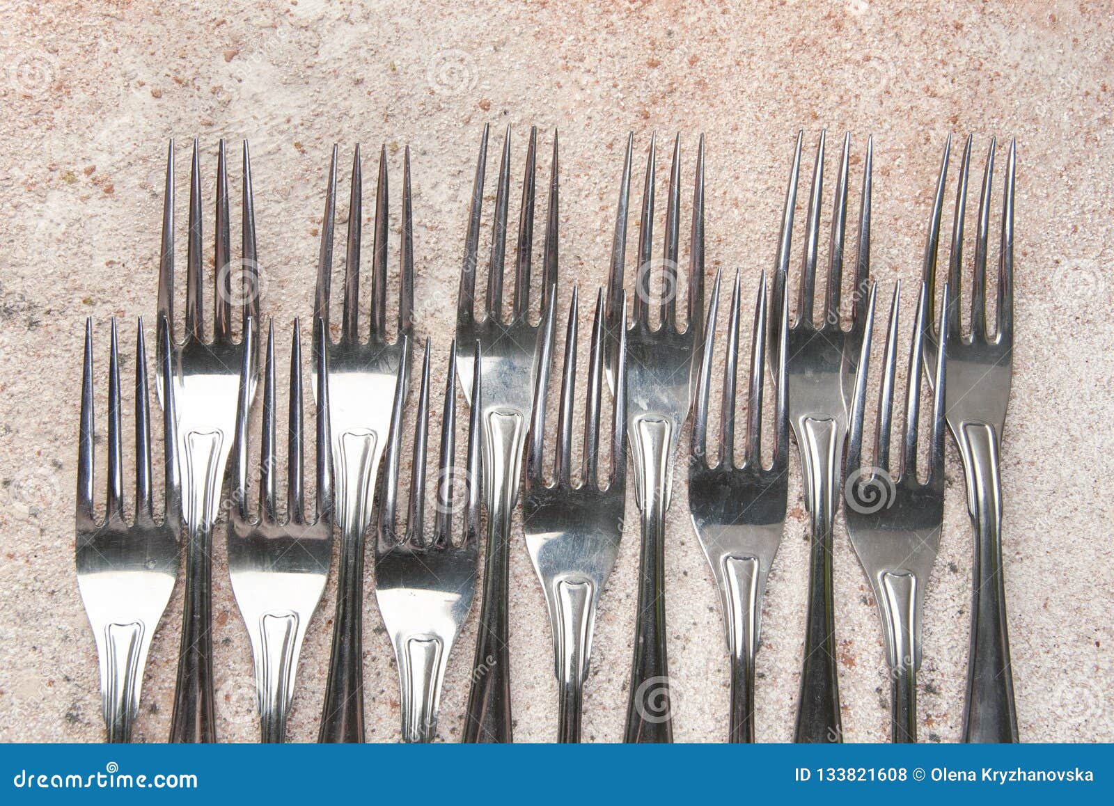 Forks on Concrete Background Stock Photo - Image of silverware, tool ...
