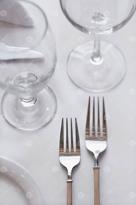 Forks on Dining Table stock image. Image of elegance - 12753153