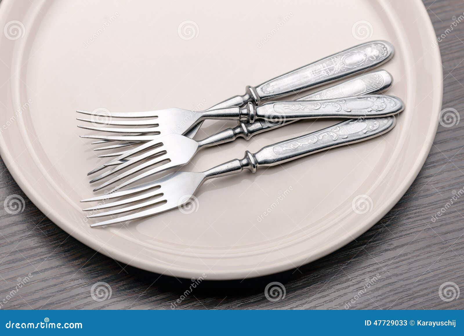 Forks in a Plate stock image. Image of antique, utensil - 47729033