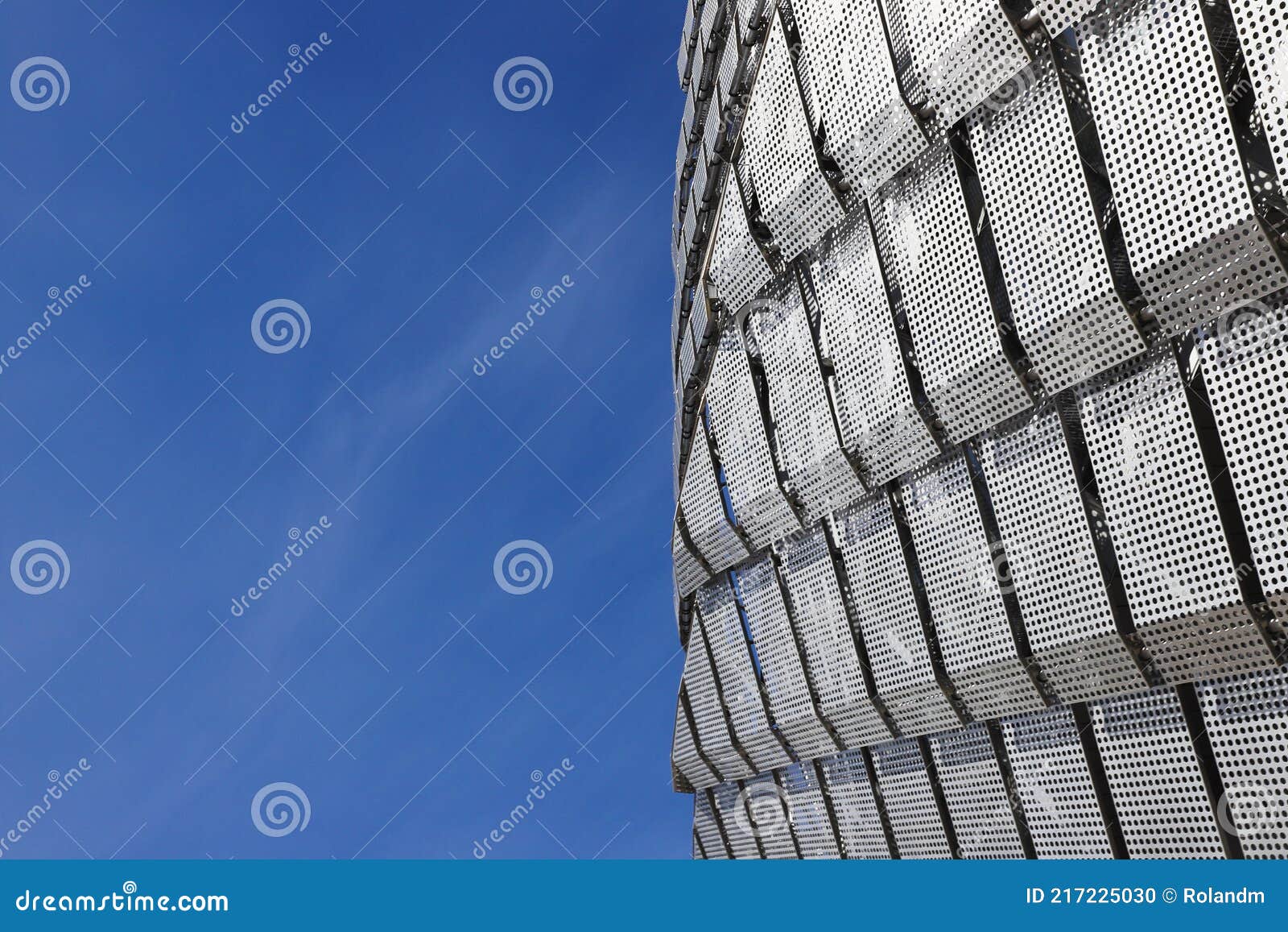 Performated metal facade stock photo. Image of pattern - 217225030