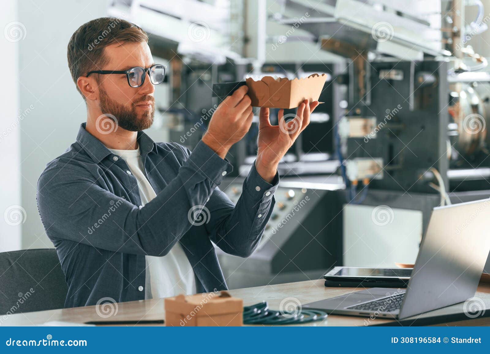Formal Clothes and Glasses, by the Table. Handsome Man is Working at ...