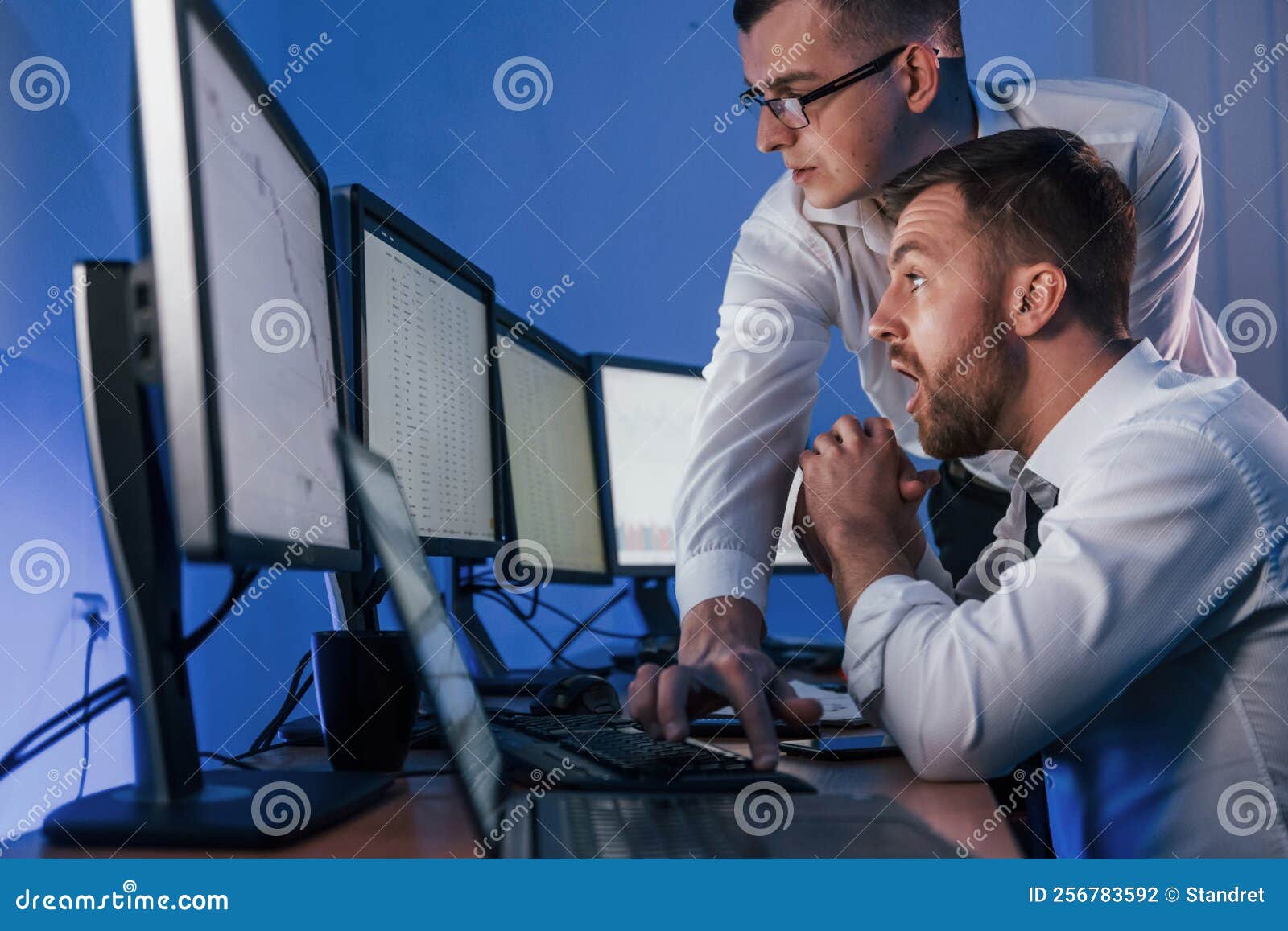 In Formal Clothes. Two Stock Traders Working in the Office with ...