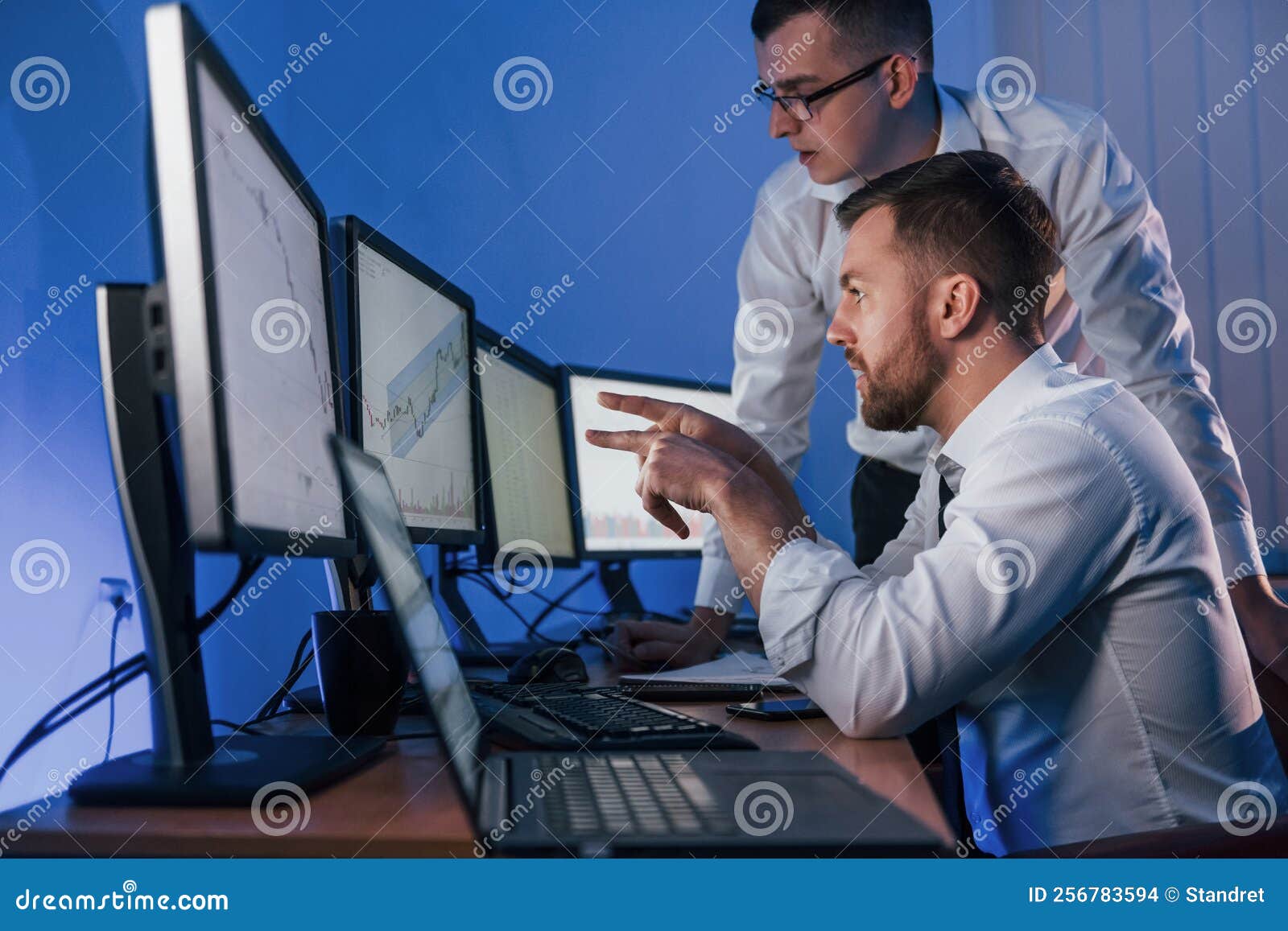 In Formal Clothes. Two Stock Traders Working in the Office with ...