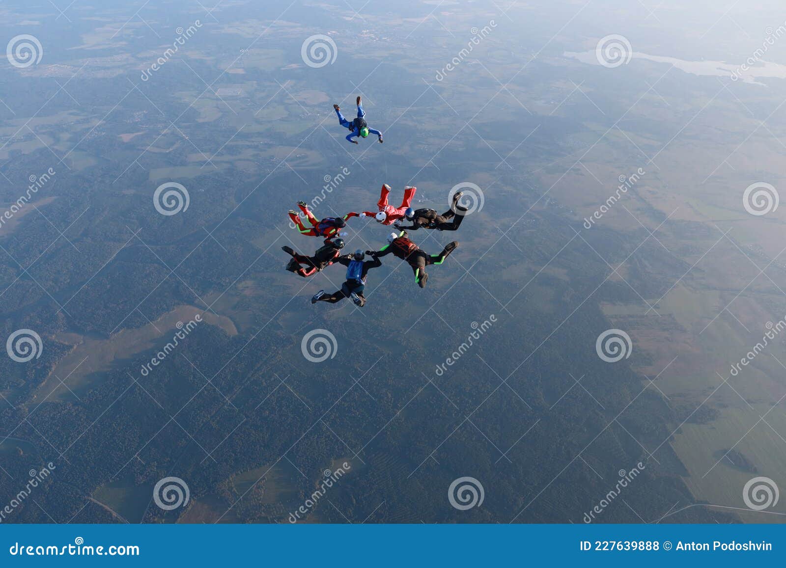 Formation Skydiving. Skydivers are Falling in the Sky. Stock Photo ...