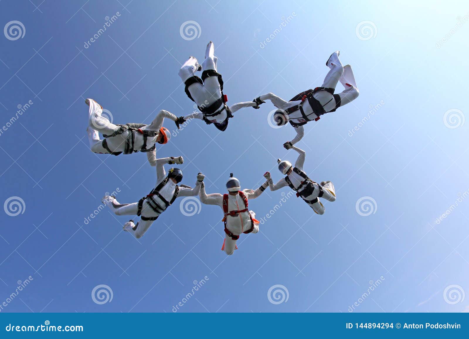 Skydiving. Two Skydivers Are Flying In The Sunset Sky. Royalty-Free ...