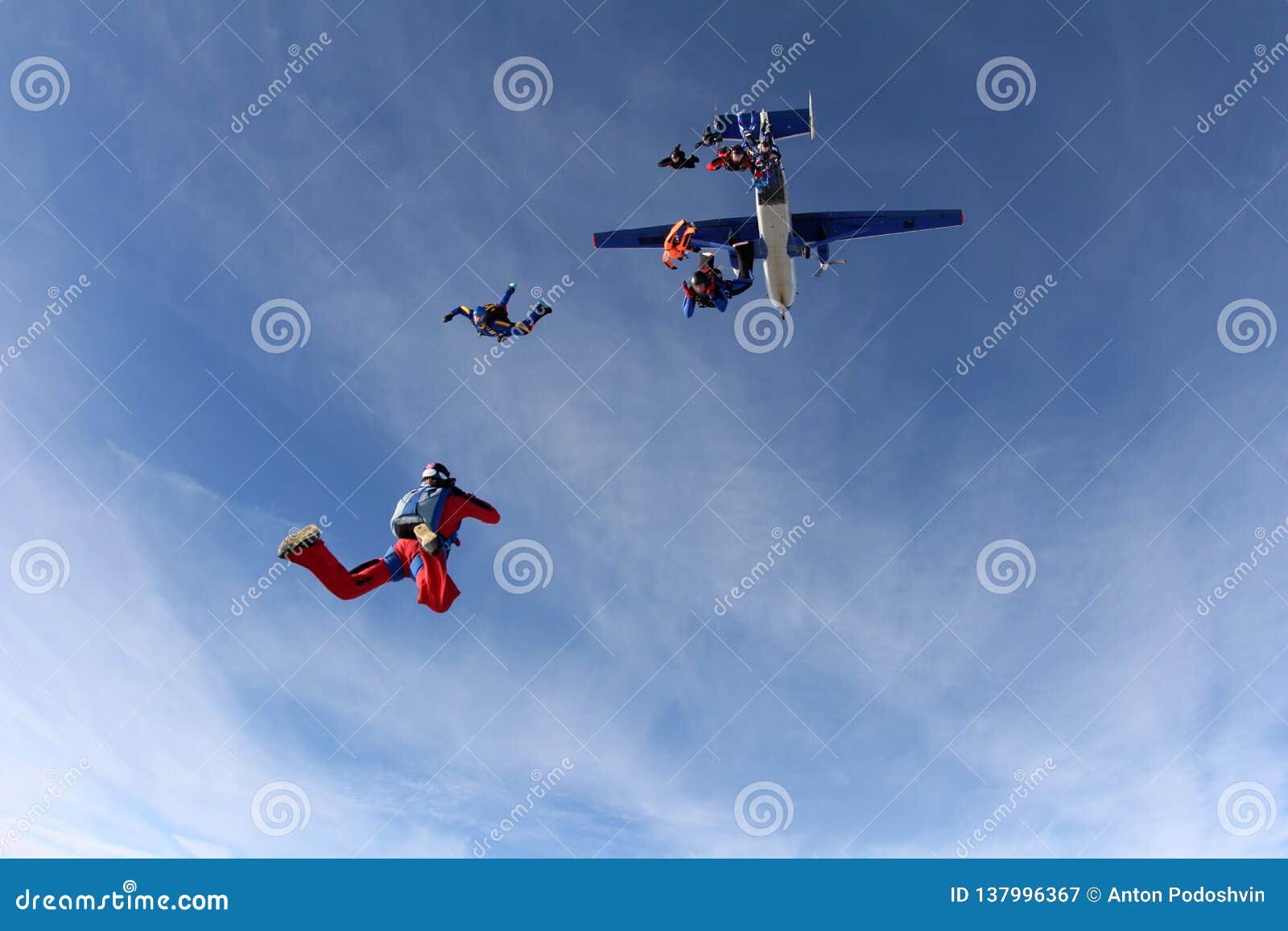 Formation Skydiving. Skydivers are Jumping Out of a Plane. Editorial ...