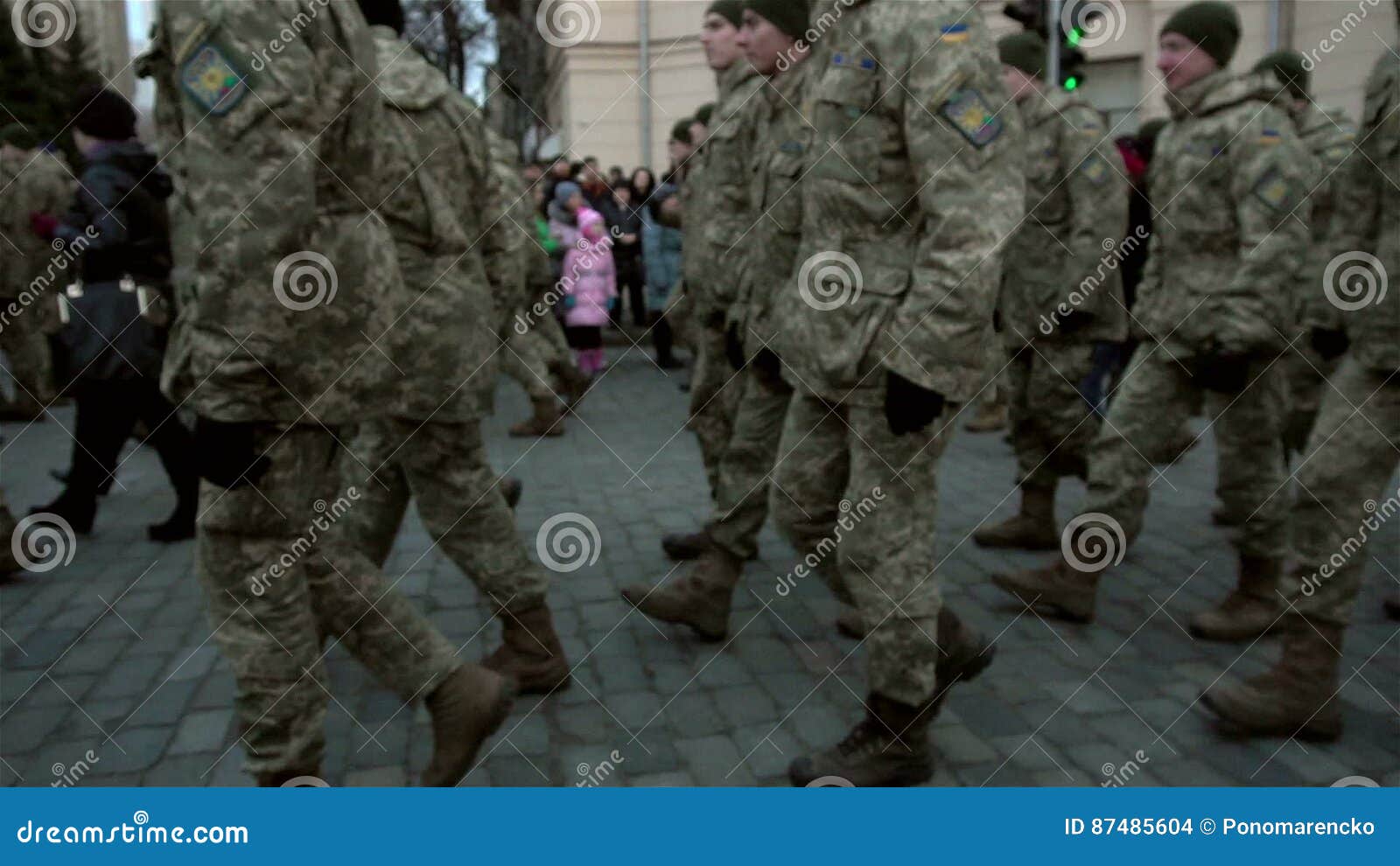 Formation of Soldiers in Uniform Marching on the Pavement on the Street ...