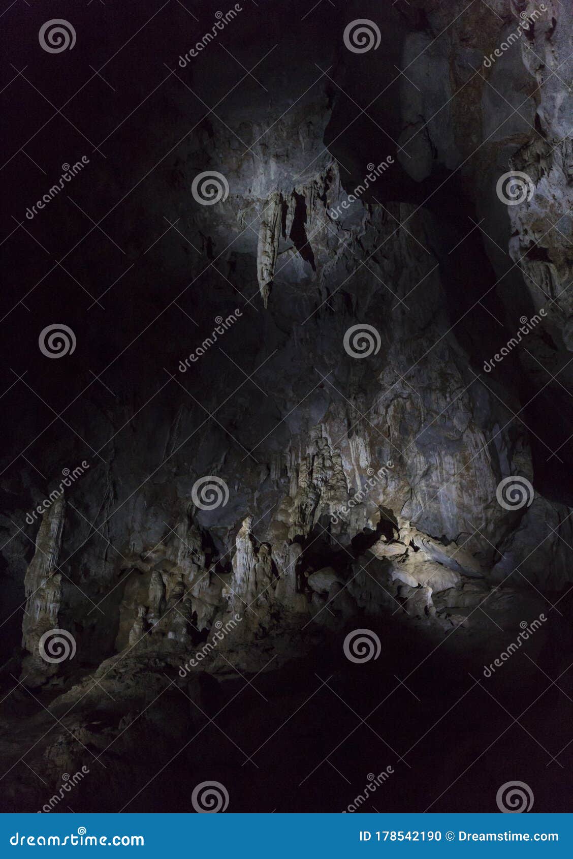 Formations in the Darkness of a Cave Stock Photo - Image of hole ...