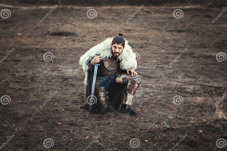 Formidable Man with a Sword. Stock Photo - Image of blade, legend: 82513752