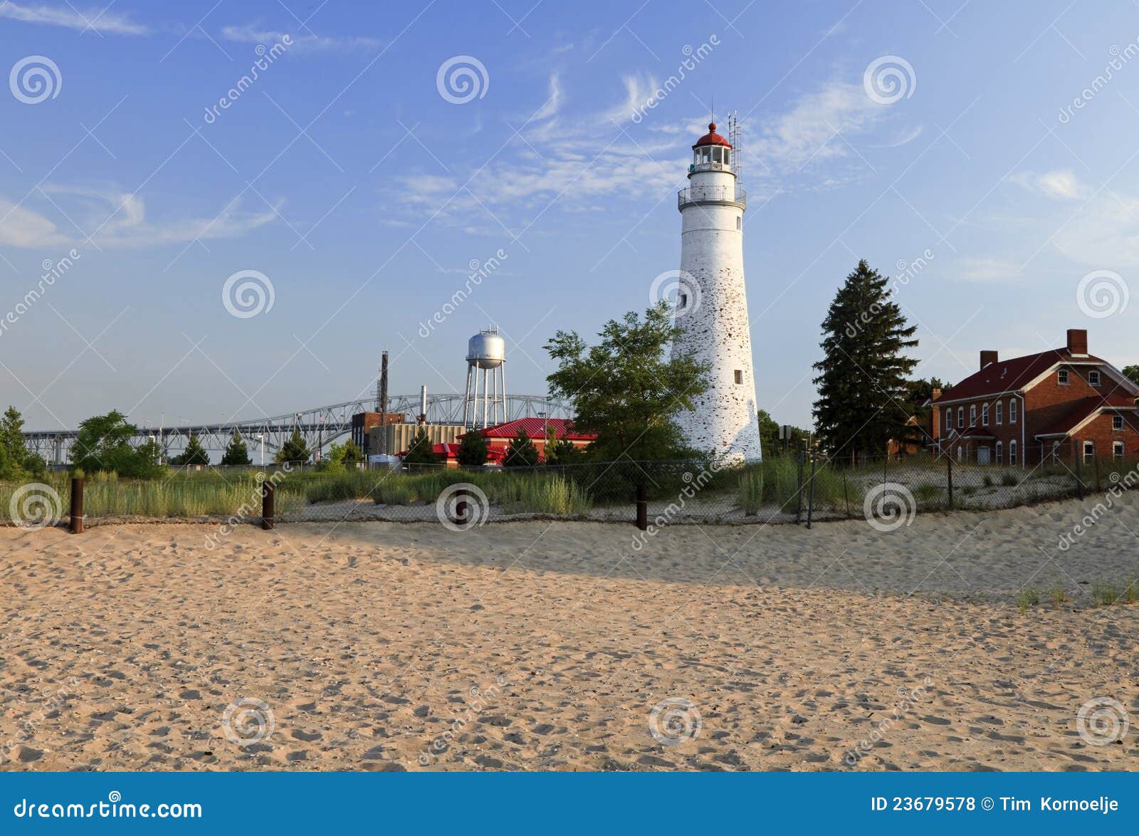 The Fort Gratiot Lighthouse In Michigan With A Freighter In The ...