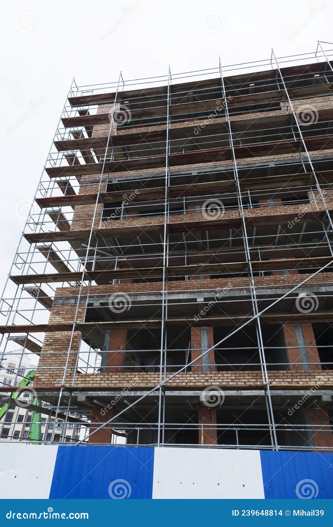 A Fortified Building Under Construction Against a Gray Sky Background ...