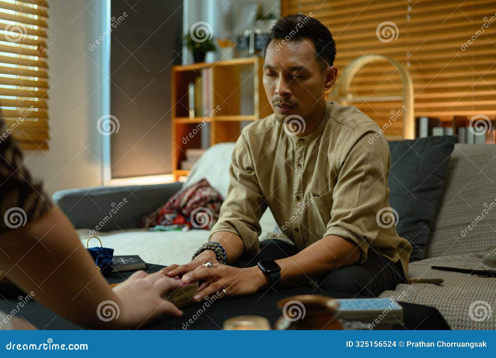 Fortune Teller Doing Tarot Card Reading and Forecasting Future for Client in Dark Room Stock ...