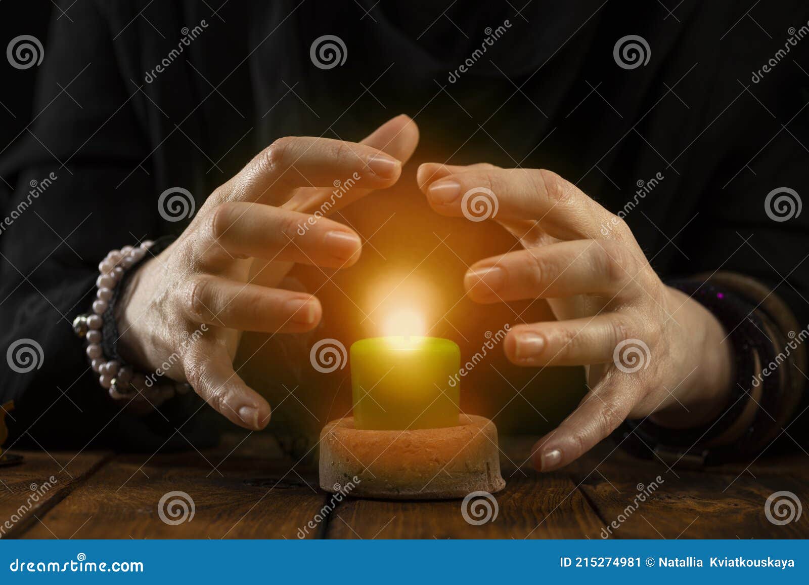 A Fortune-teller or Oracle with Objects for Fortune-telling Holds a ...