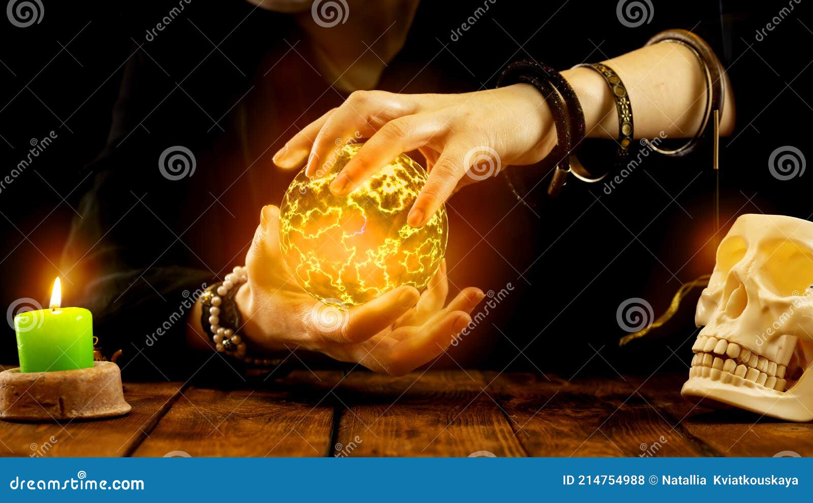 A Fortune-teller or Oracle with Objects for Fortune-telling Holds a ...