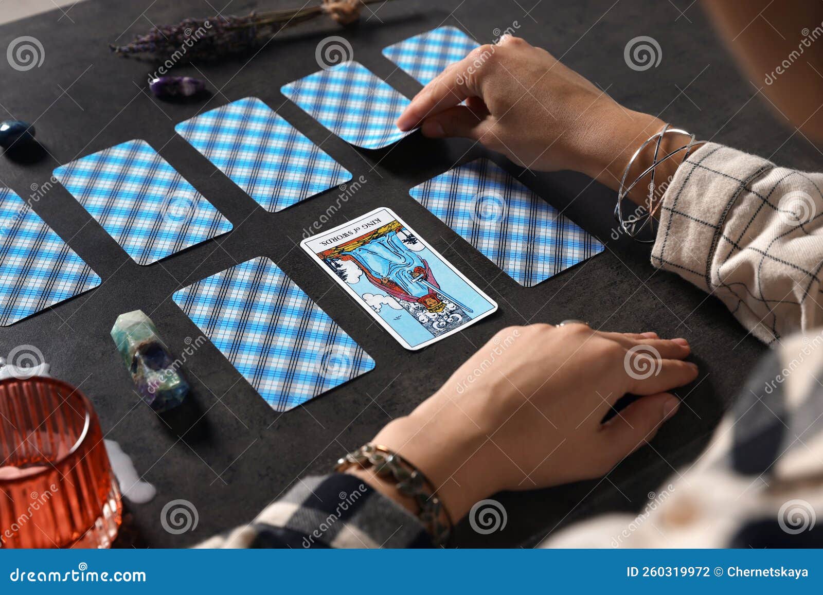 Fortune Teller Predicting Future on Spread of Tarot Cards at Grey Table ...
