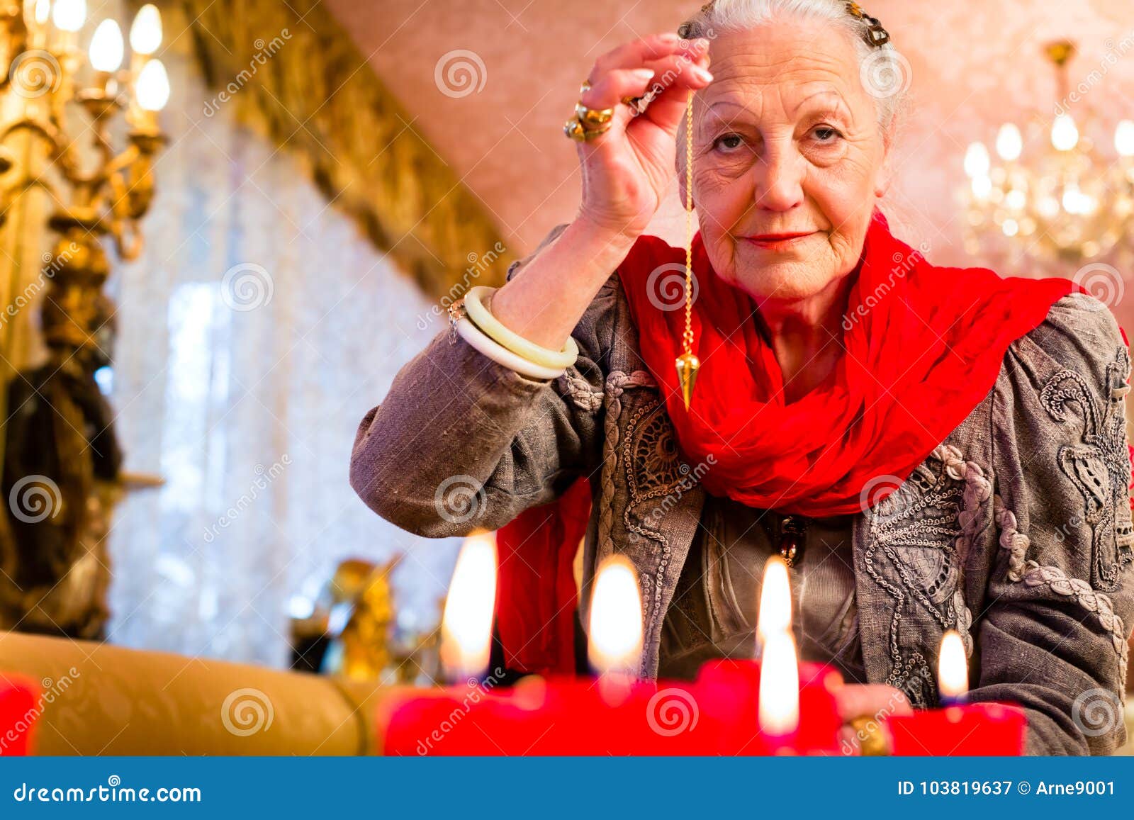 Fortuneteller in Seance with Pendulum Stock Image - Image of light ...