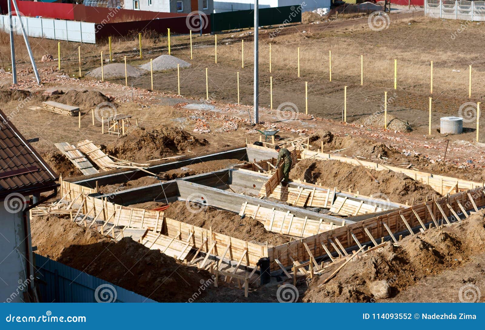 The Foundation of the House Under Construction, Fresh Concrete ...