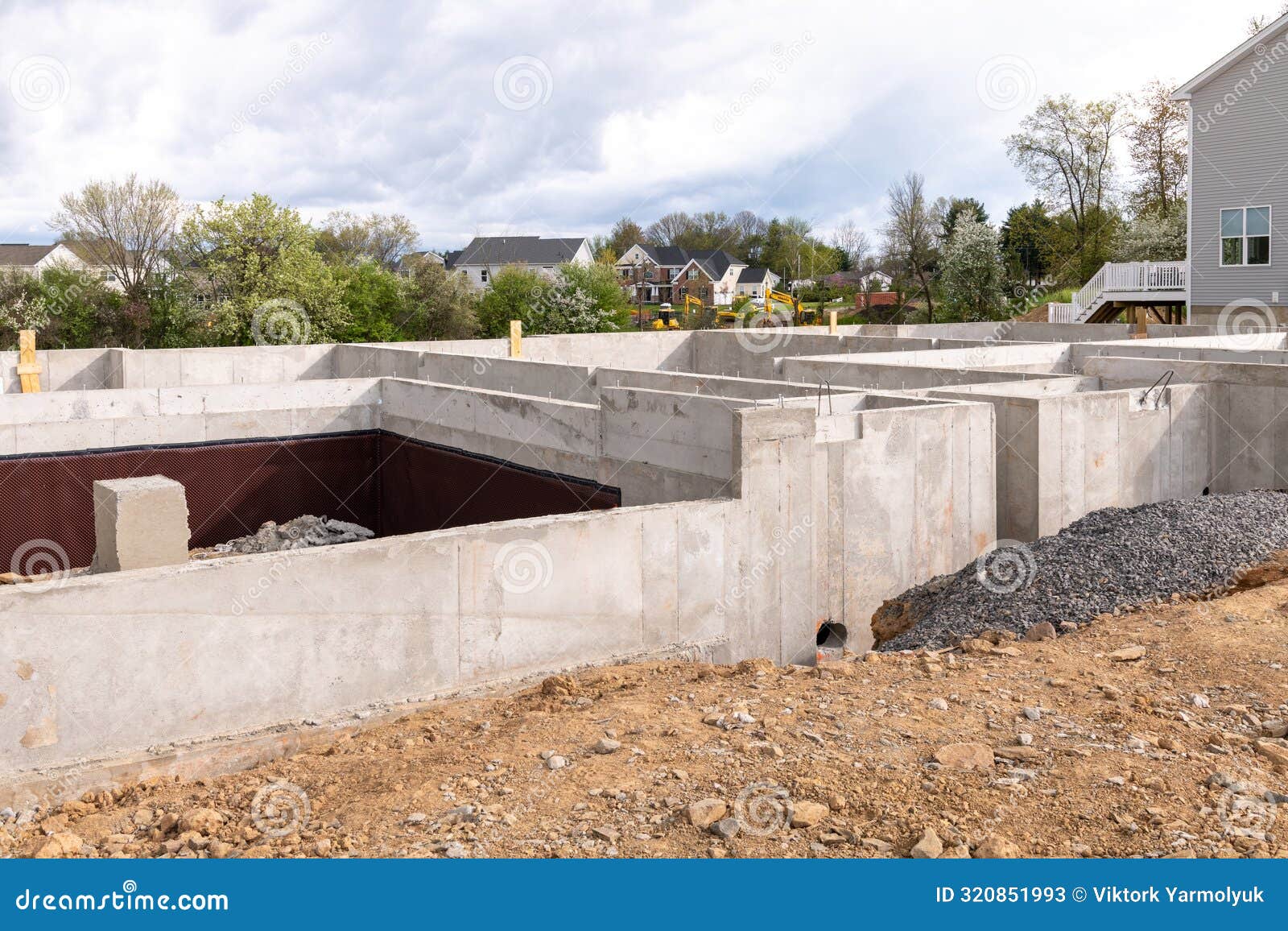 Foundation for a new house stock image. Image of site - 320851993