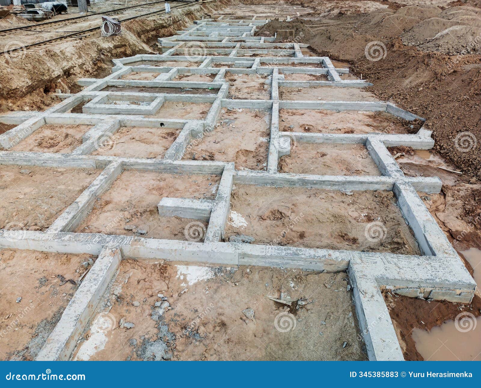 Construction Site with Foundation Frames Laid Out Intricately in a ...