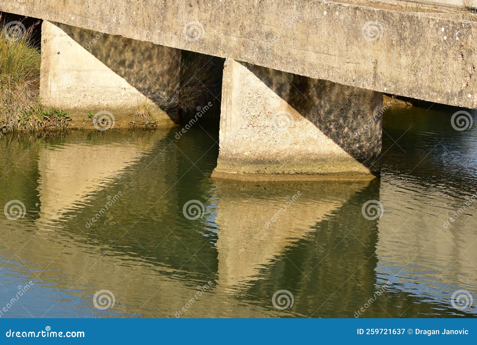 Foundations of a bridge stock image. Image of pond, reflection - 259721637