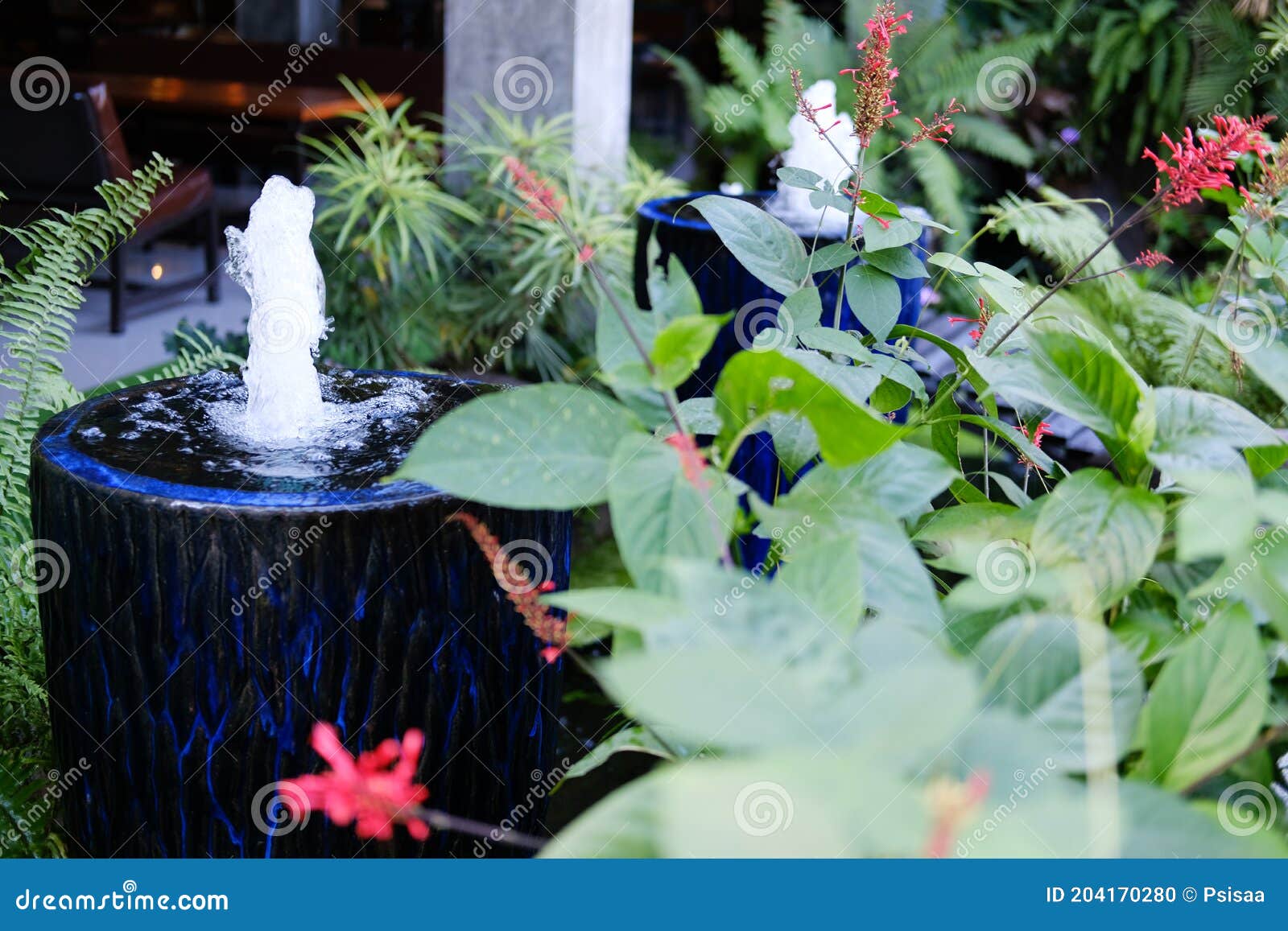 Fountain on Blue Water Jar Decorating in Garden Stock Photo - Image of ...