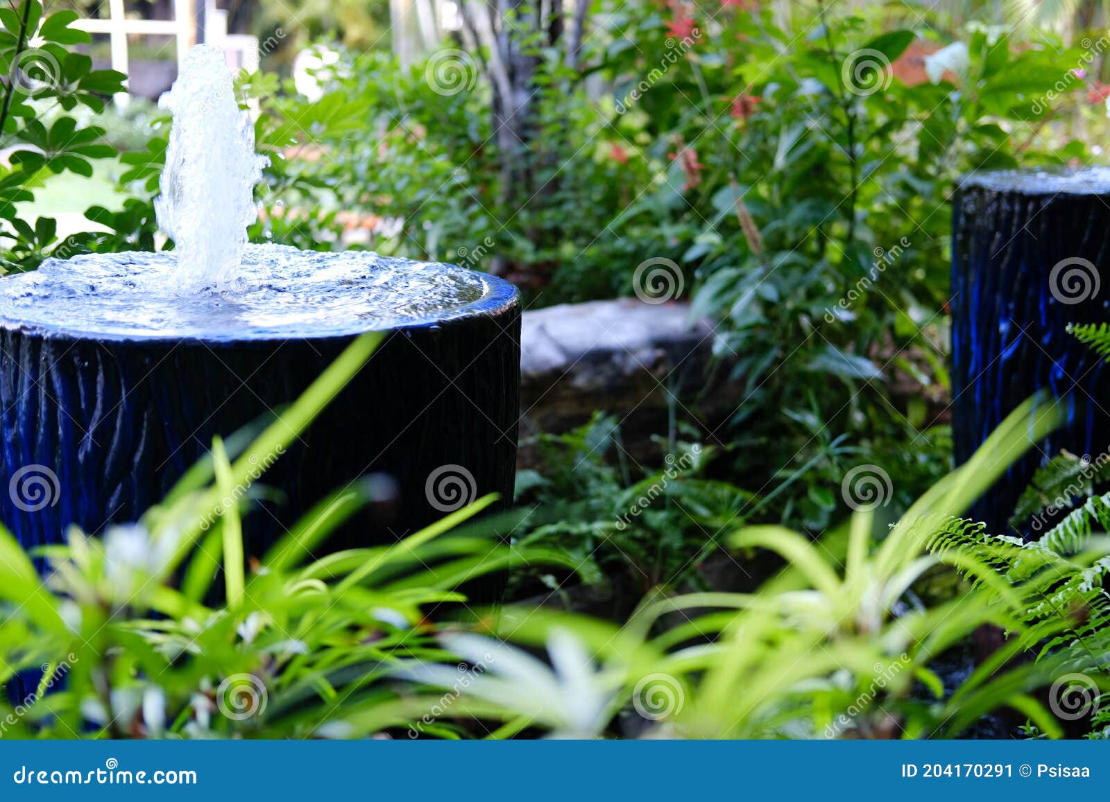 Fountain on Blue Water Jar Decorating in Garden Stock Image - Image of ...