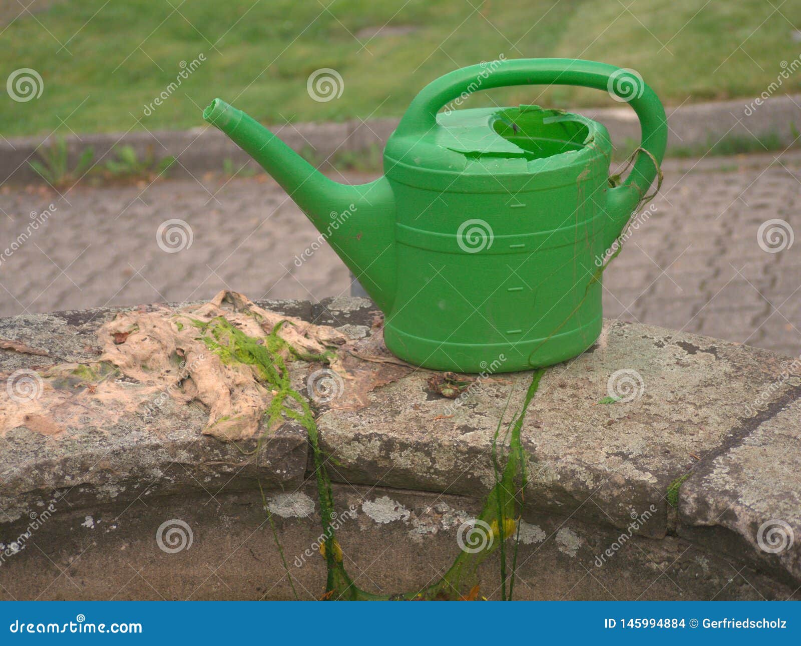 Fountain with Brick Wall,defective Watering Can.Masonry Polluted with ...
