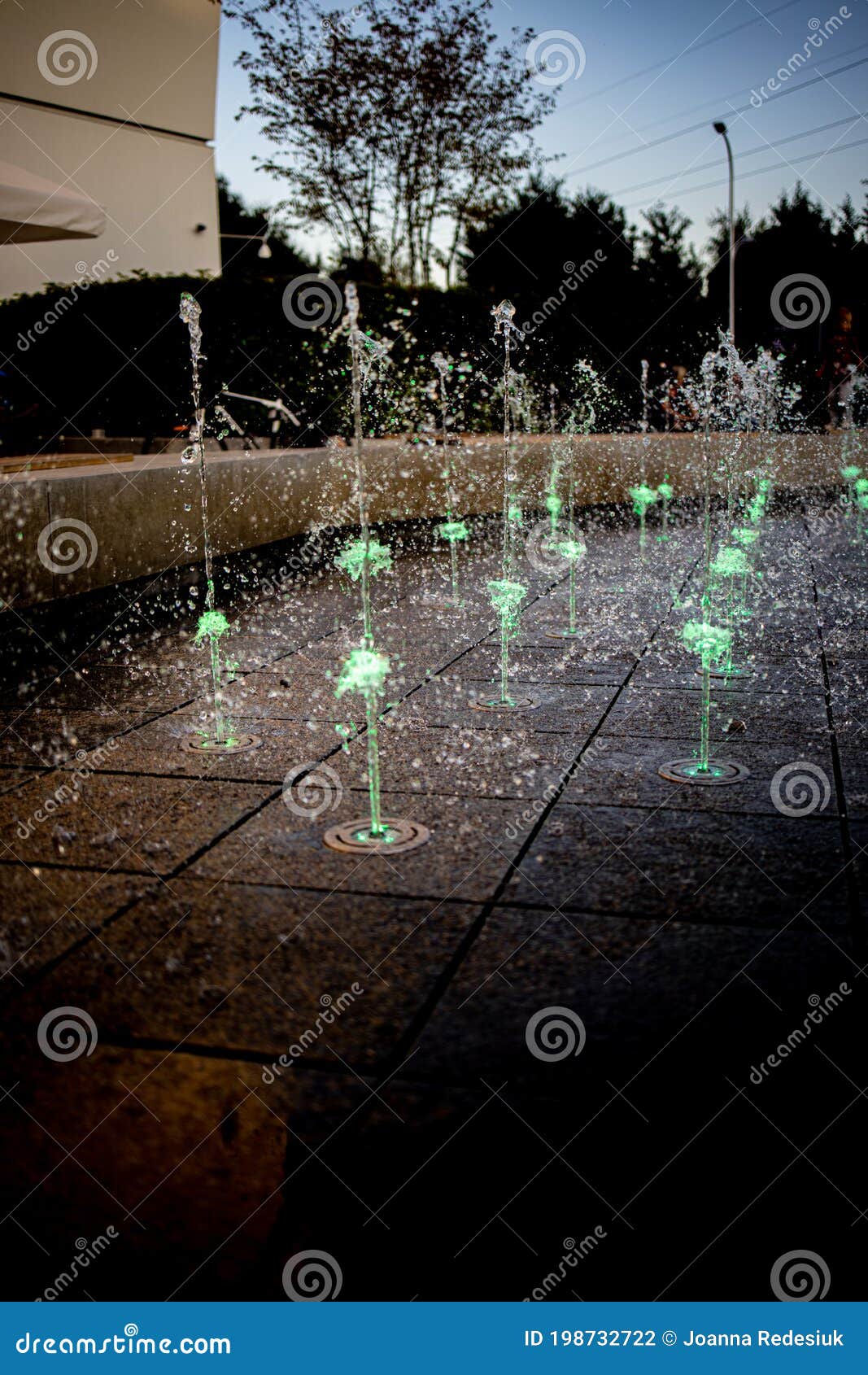 Fountain with Colorfully Lit in the Evening Stock Photo - Image of ...