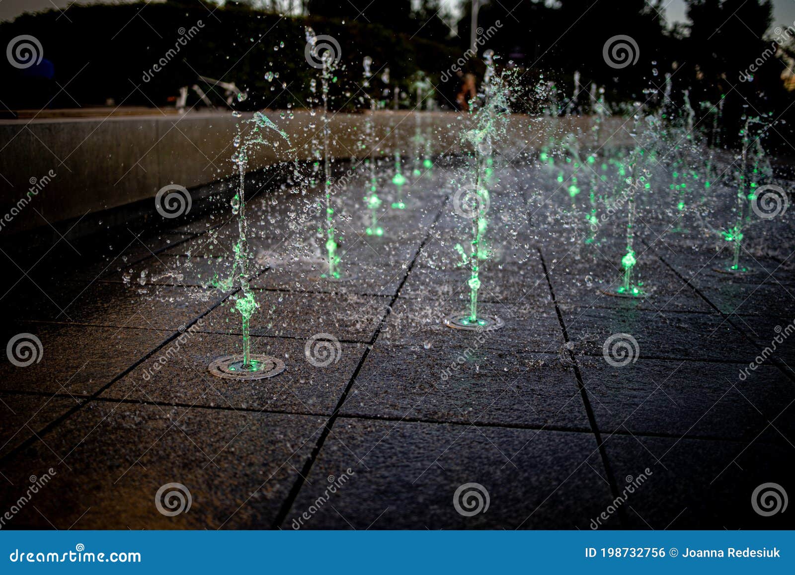 Fountain with Colorfully Lit in the Evening Stock Photo - Image of ...
