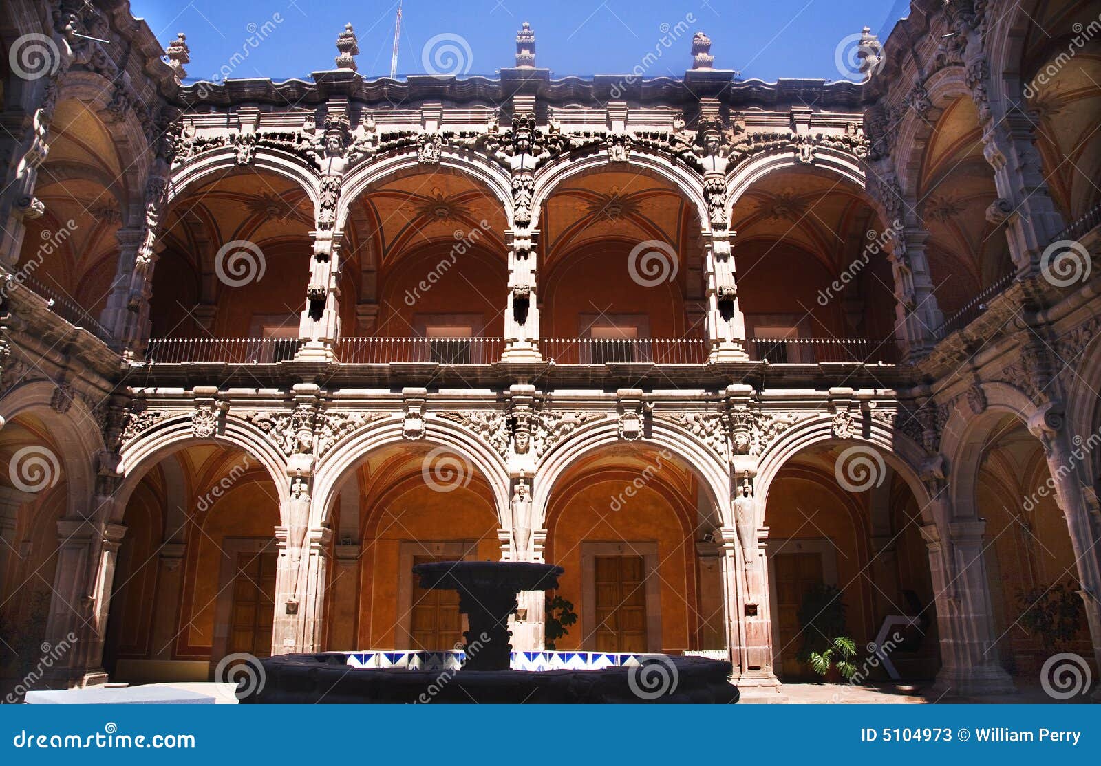 Fountain Courtyard Orange Arches Sculptures Stock Image - Image of ...