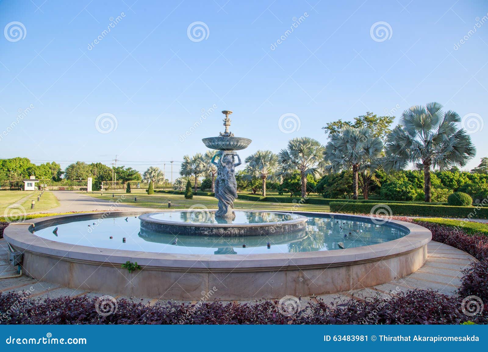 Fountain in green garden stock image. Image of fountain - 63483981