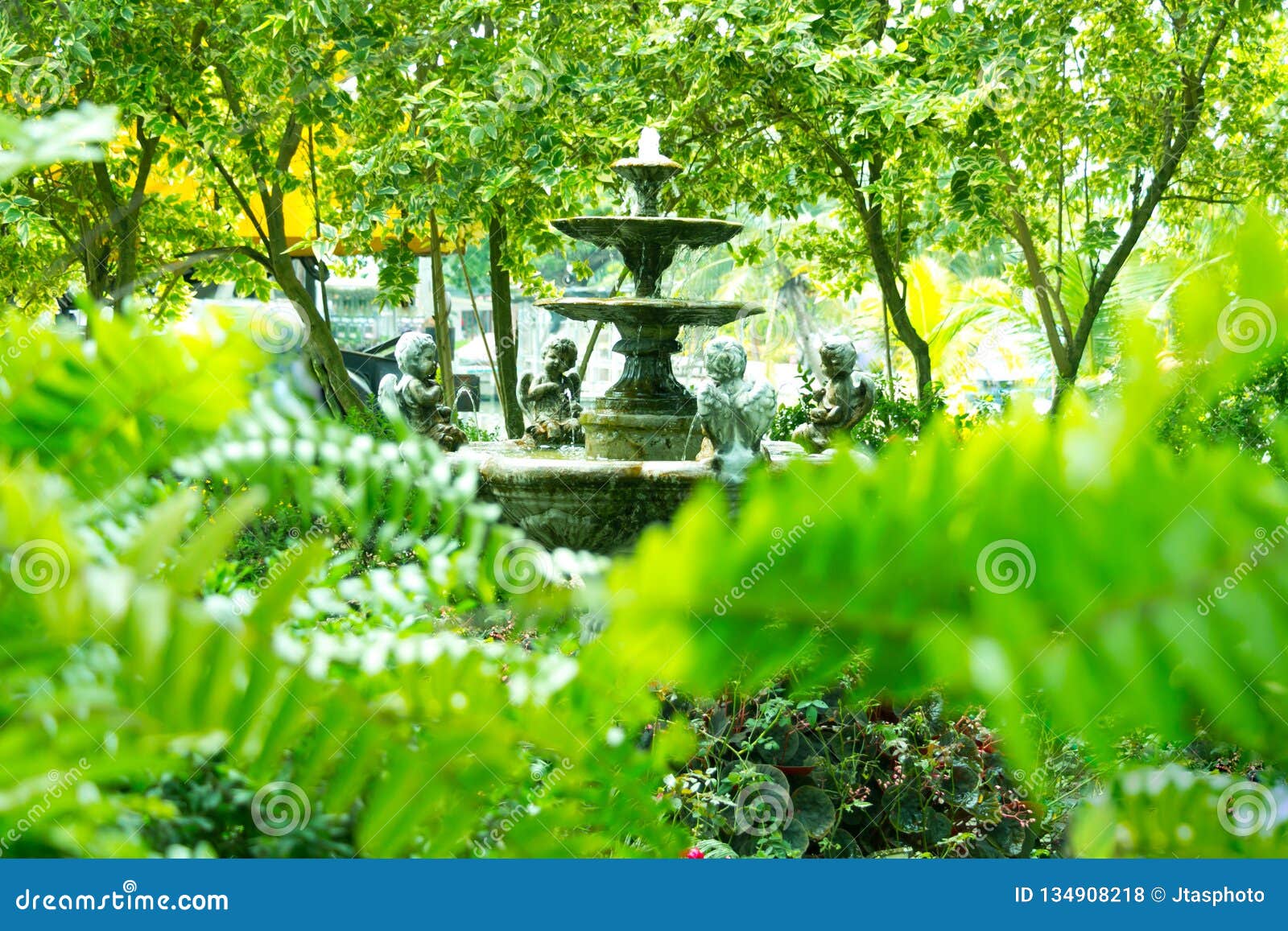 Fountain Multi-tiered Vintage Style in Green Garden Stock Photo - Image ...