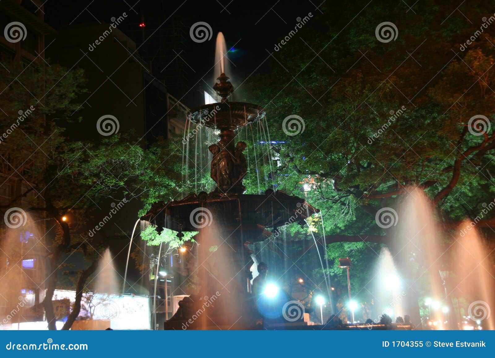 Fountain, night stock image. Image of water, city, lights - 1704355
