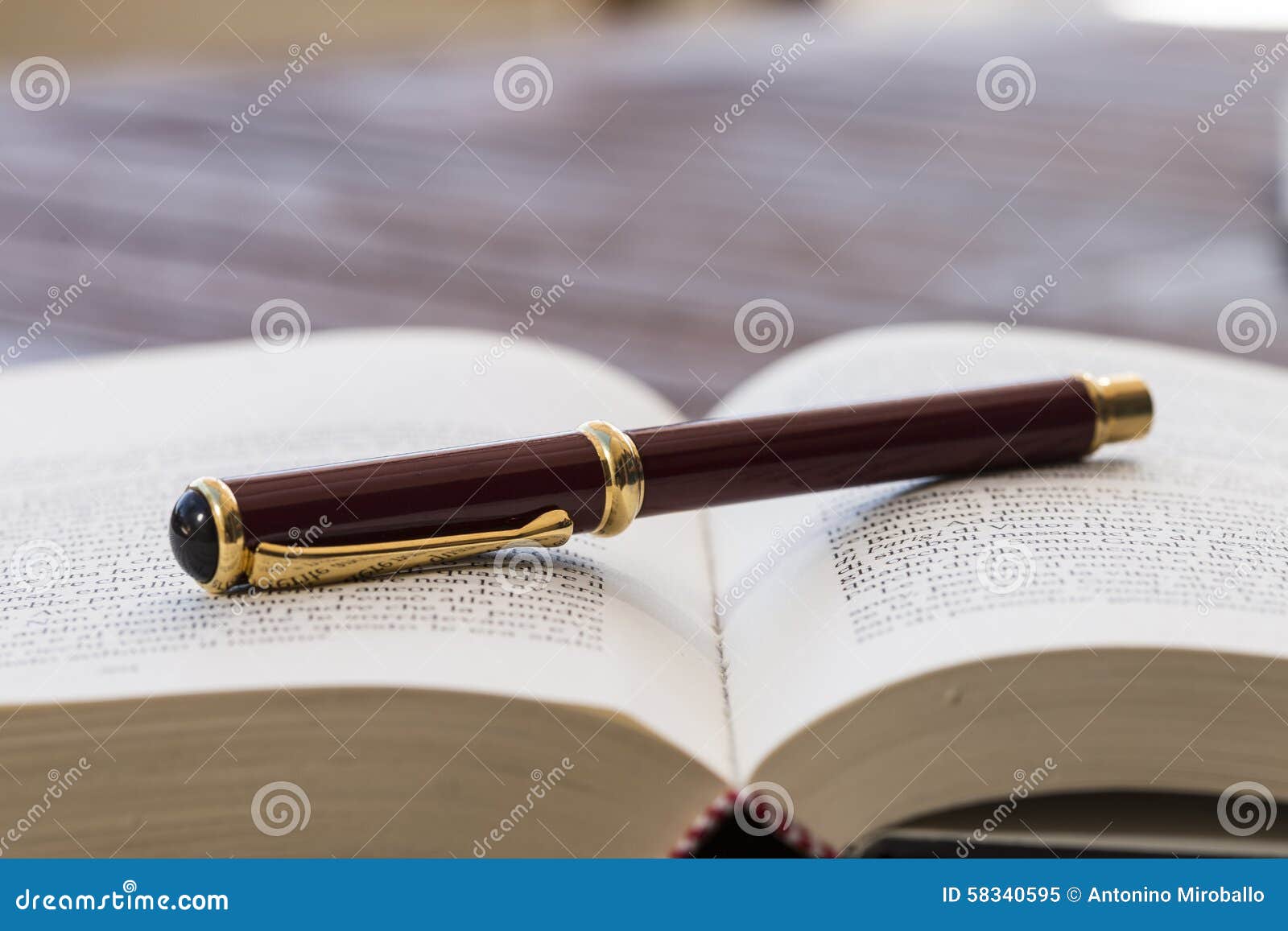 Fountain pen on a book stock image. Image of student - 58340595