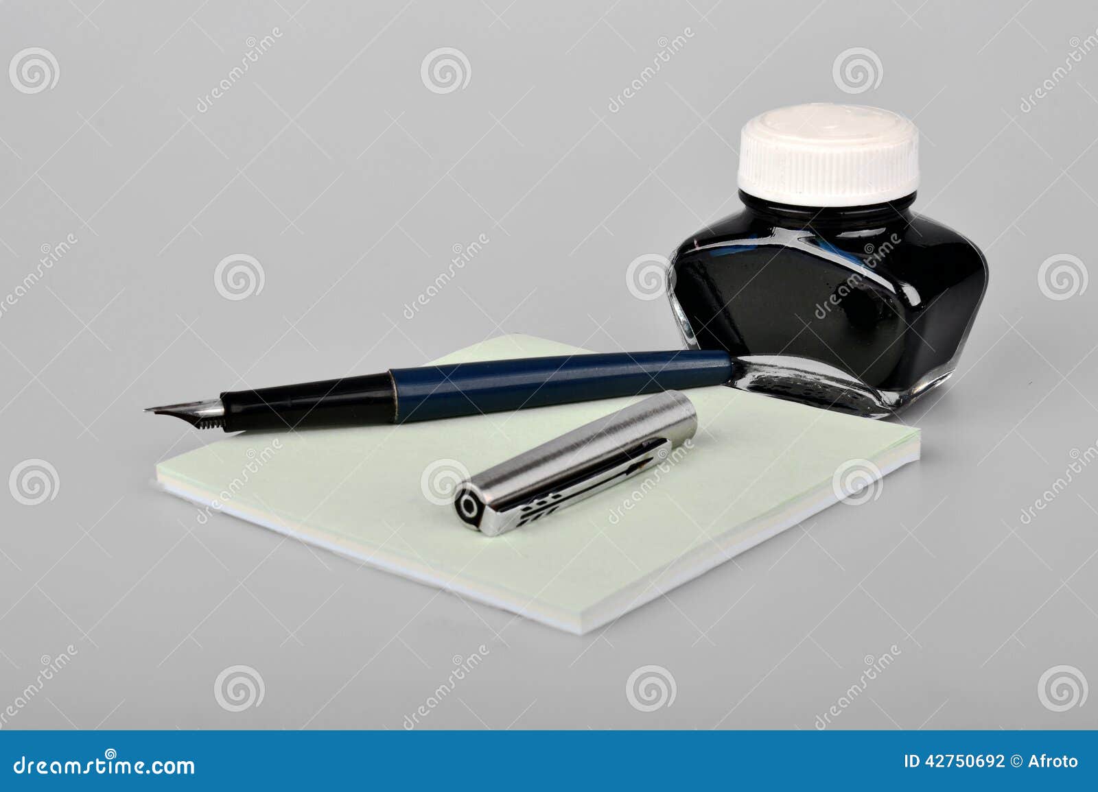 Fountain Pen with Ink Bottle and Paper Stock Photo - Image of white ...